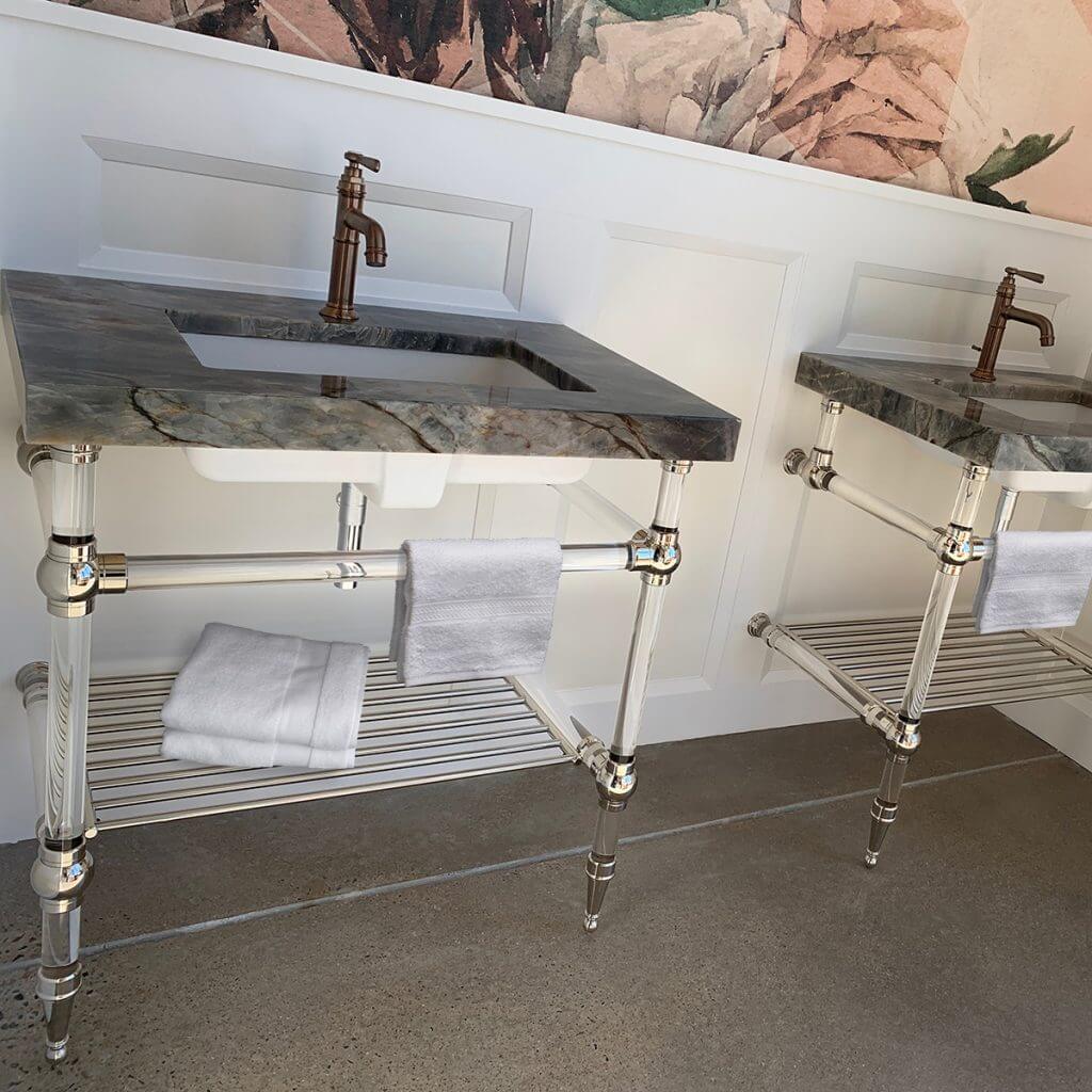 A pair of Tapered Foot style vanities in polished nickel with Perma ...